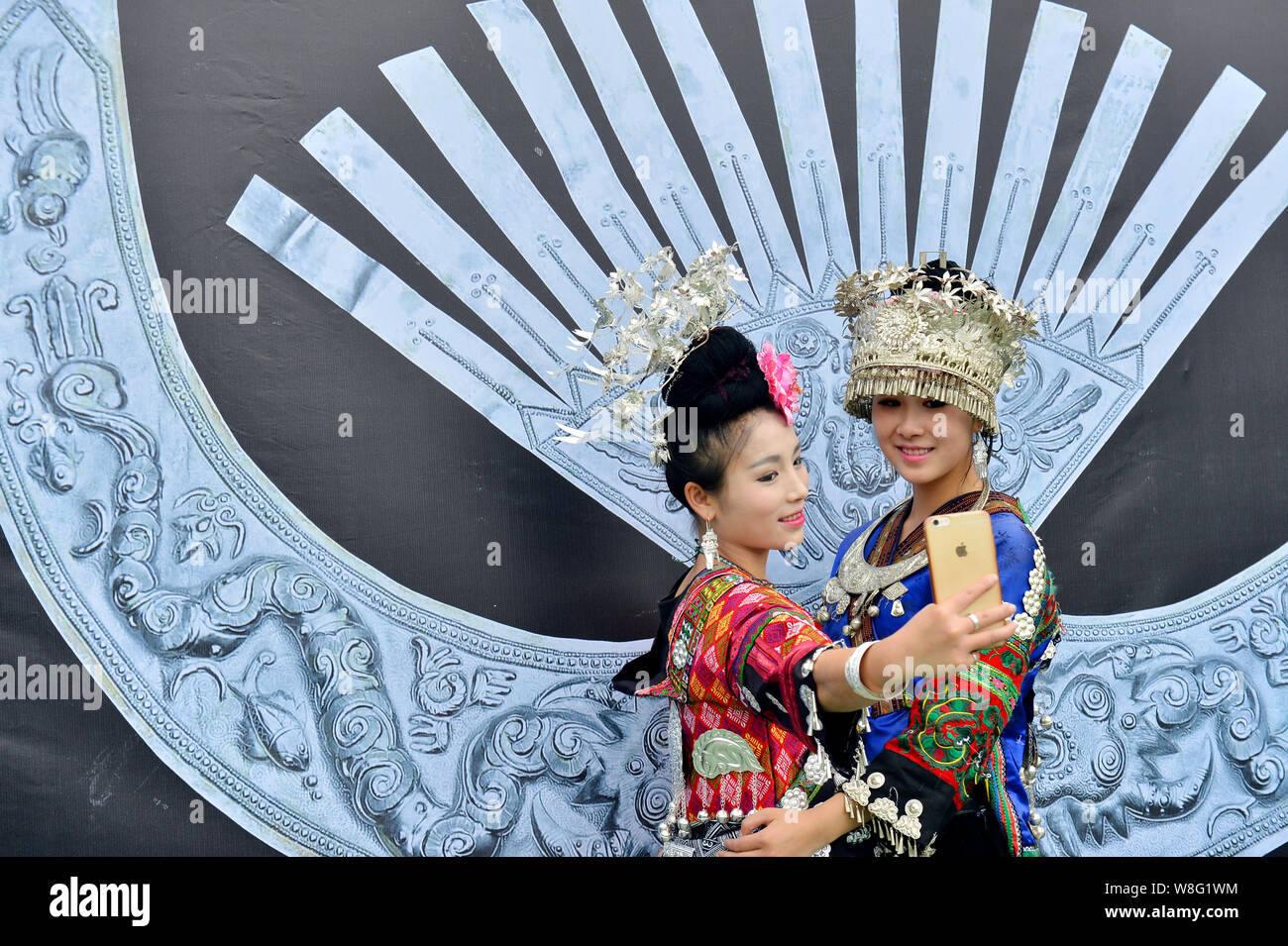 Young Chinese girls of Miao ethnic minority in traditional costumes ...