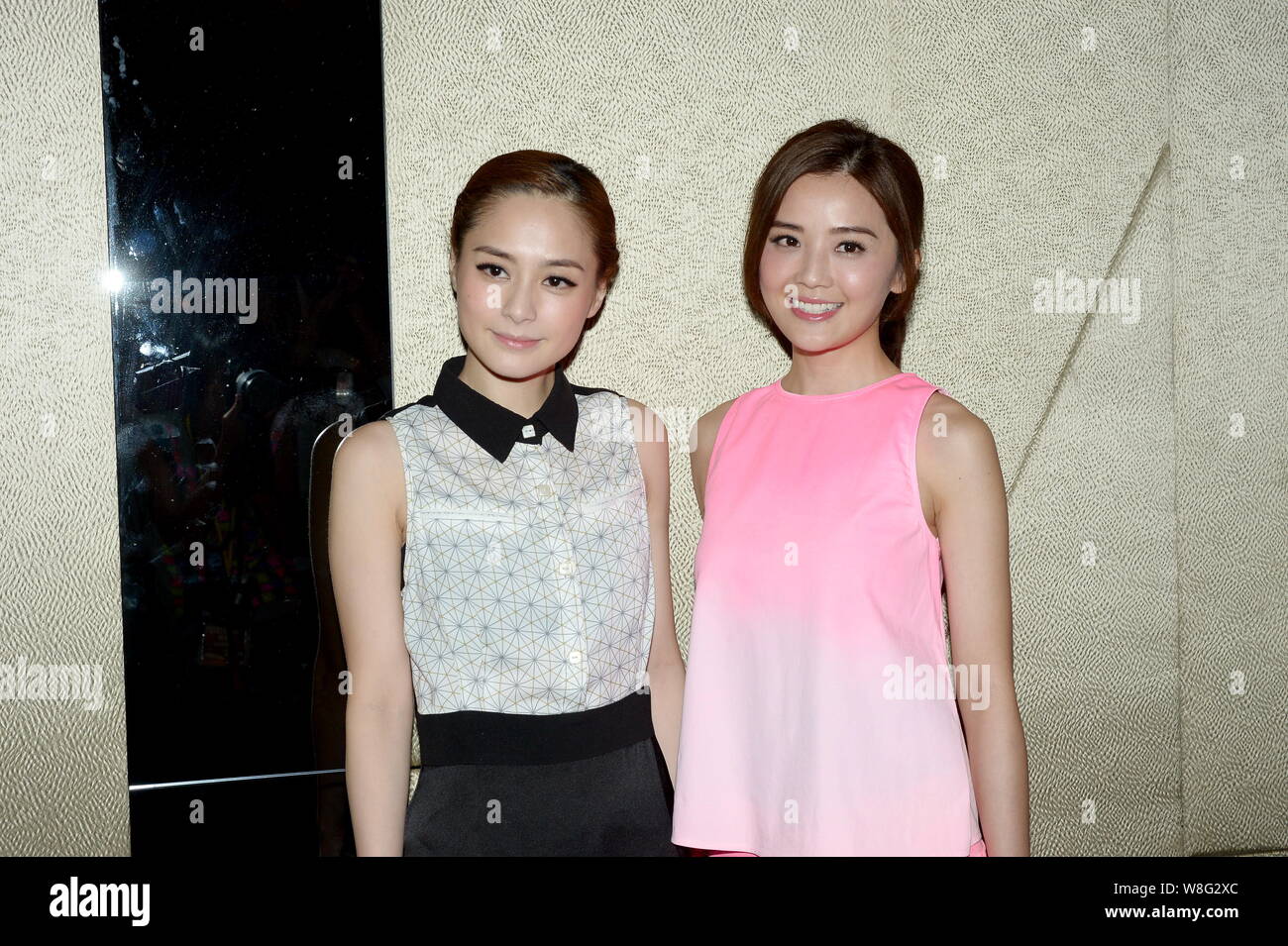 Singers and actresses Gillian Chung, left, and Charlene Choi of Hong ...