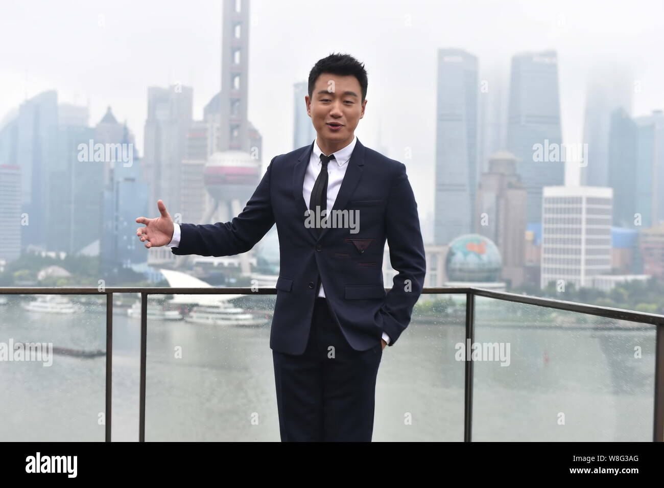 Chinese actor Dong Dawei poses during a photocall for his movie ...