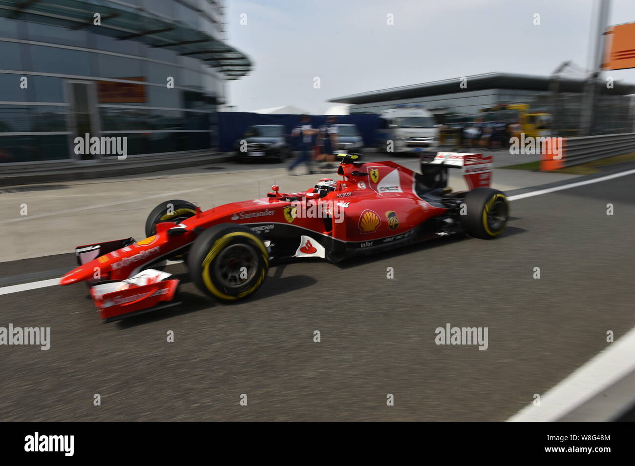 Finnish F1 driver Kimi Raikkonen of Ferrari steers his car during a ...