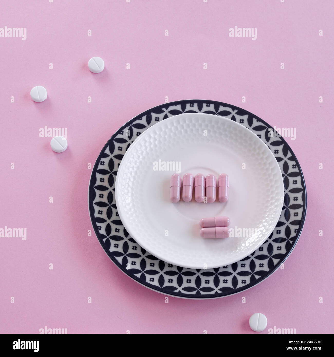 Pills in the dish. Concepts - what we eat, hidden ingredients ...