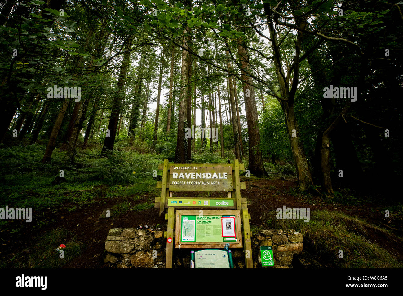 A sign post for Ravensdale Forest recreation area. Claims that the ...