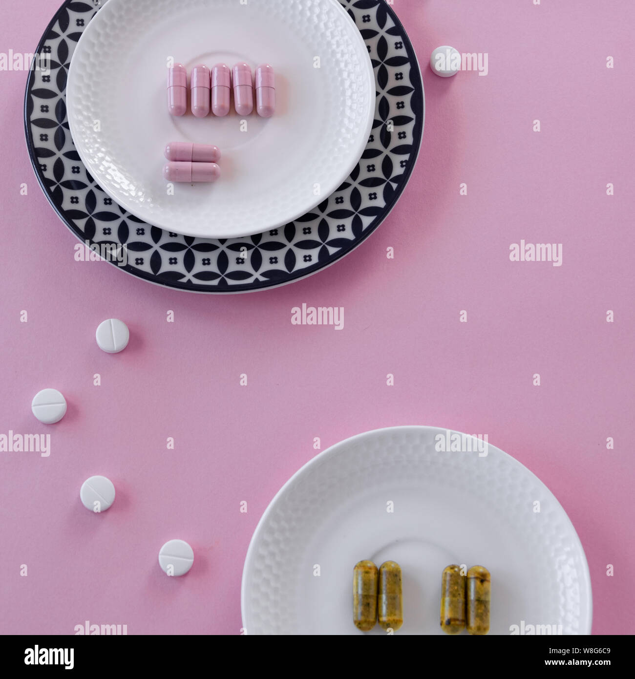 Pills in the dish. Concepts - what we eat, hidden ingredients ...
