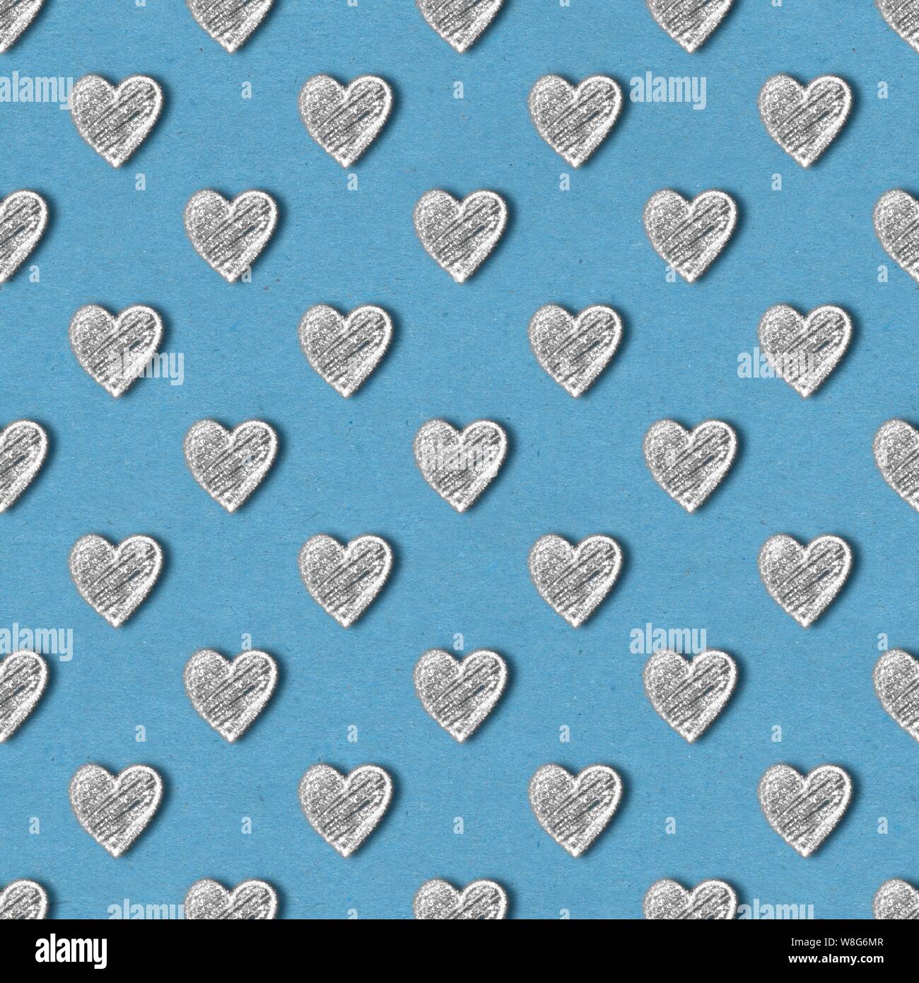 Silver hearts seamless pattern on old paper background Stock Photo - Alamy