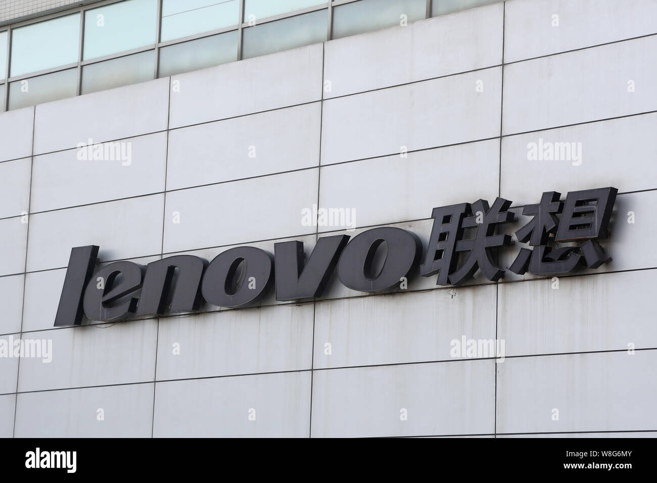 --FILE--A signboard of Lenovo is seen on the office building of Lenovo ...