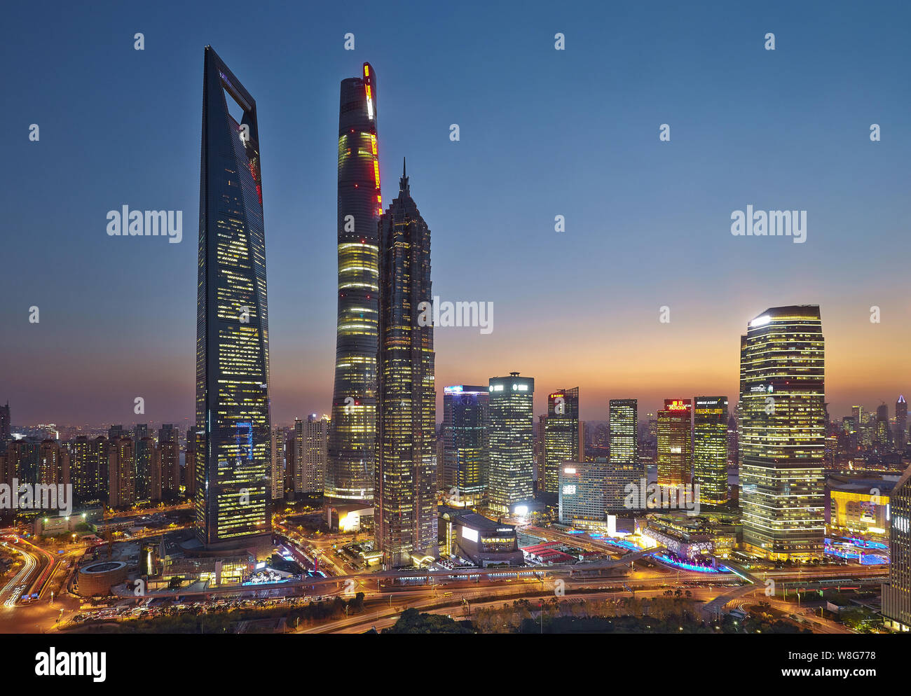 Night view of the Lujiazui Financial District with the Shanghai Tower ...