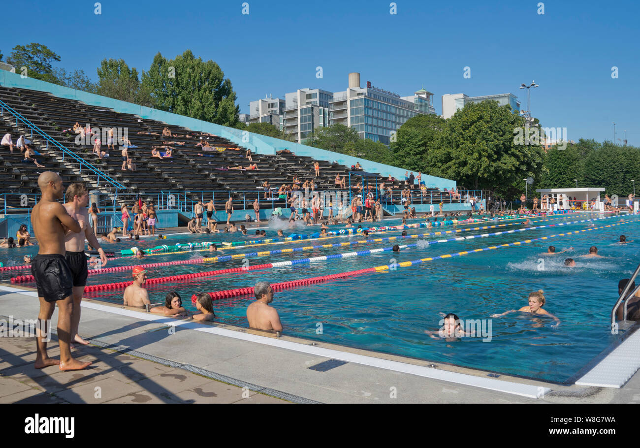 People enjoy public open-air swimming pool in the summer in Stockholm ...