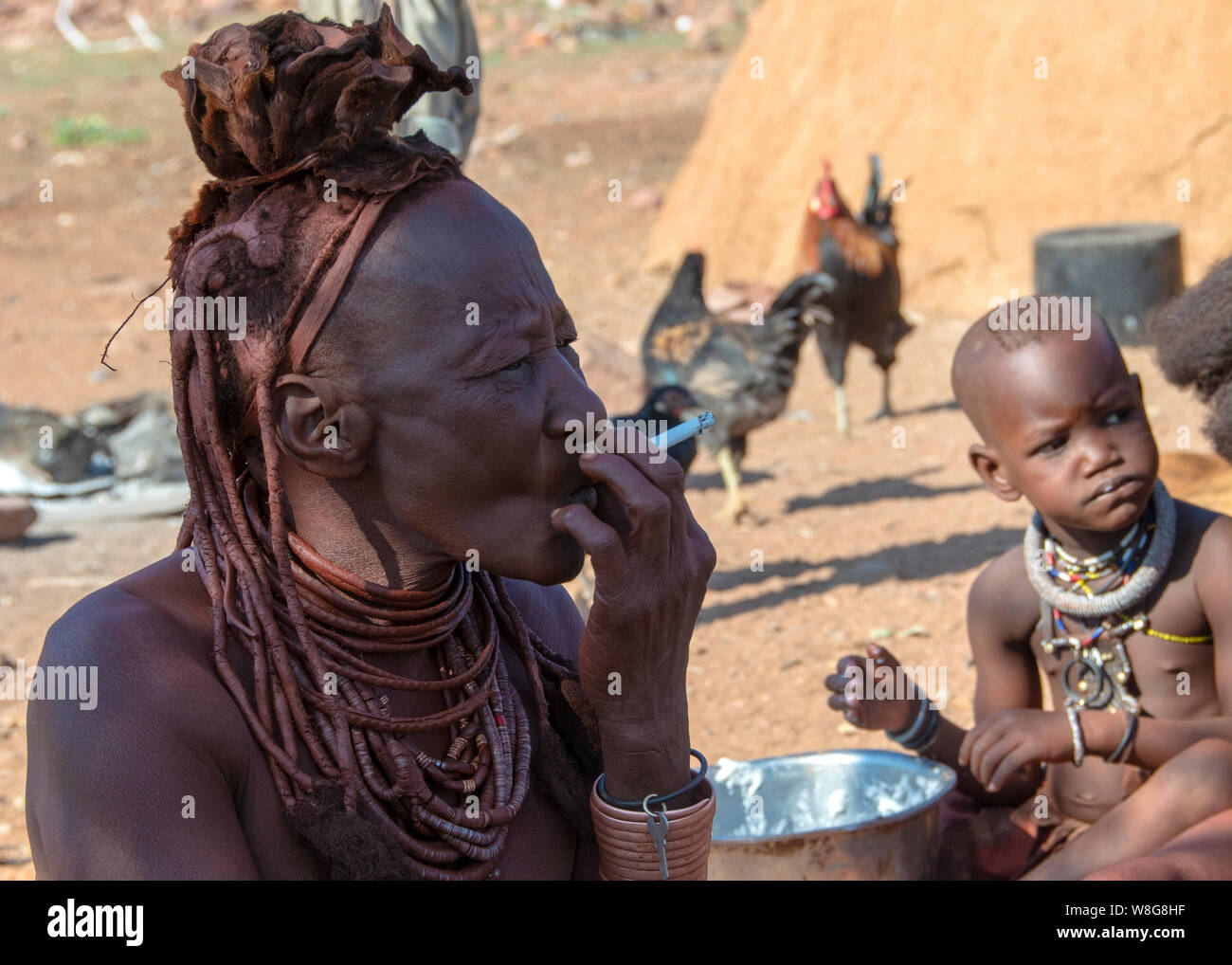 Himba woman clay hair hi-res stock photography and images - Alamy
