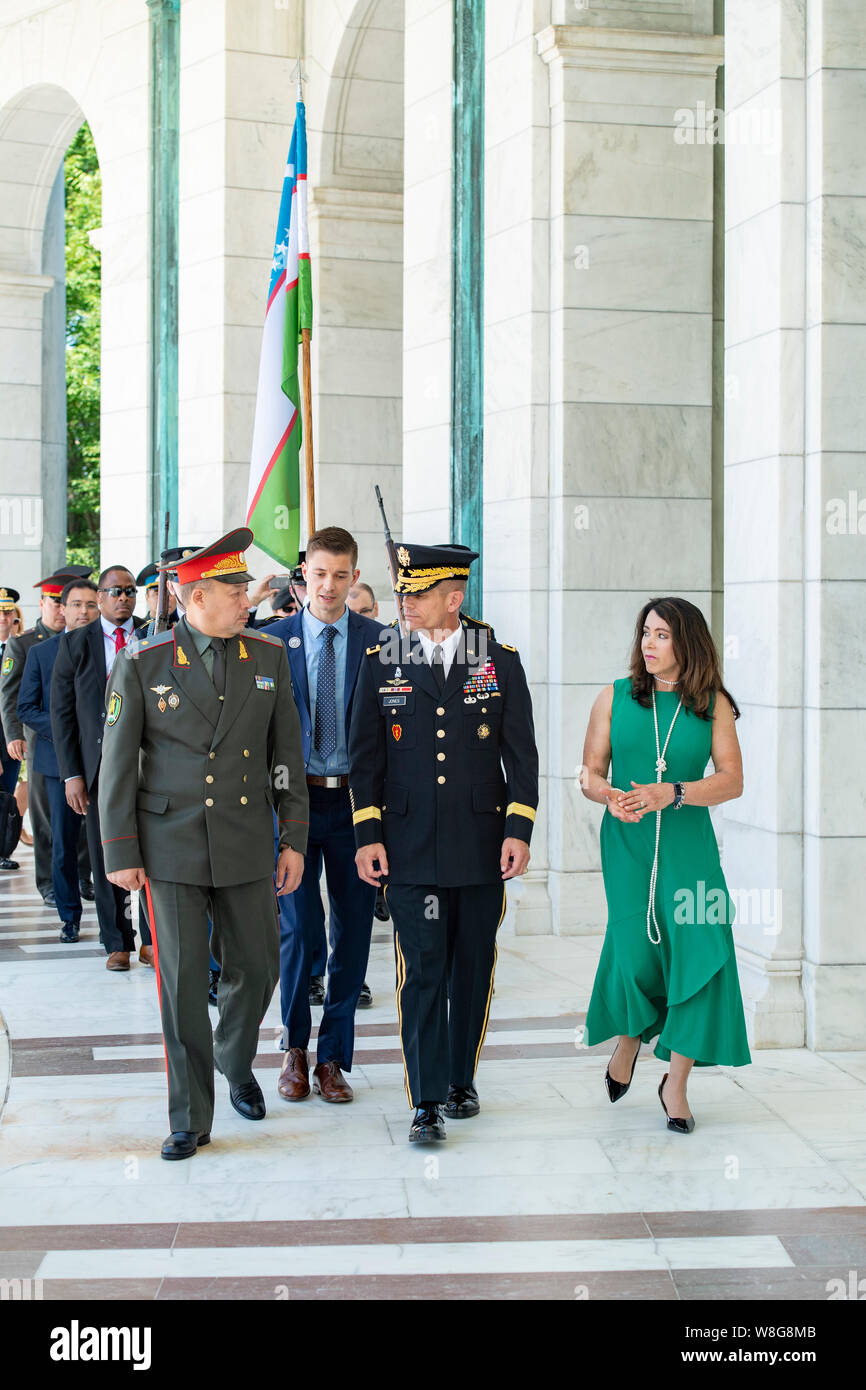 Maj. Gen. Bakhodir Kurbanov (left), minister of defense, Uzbekistan; U ...