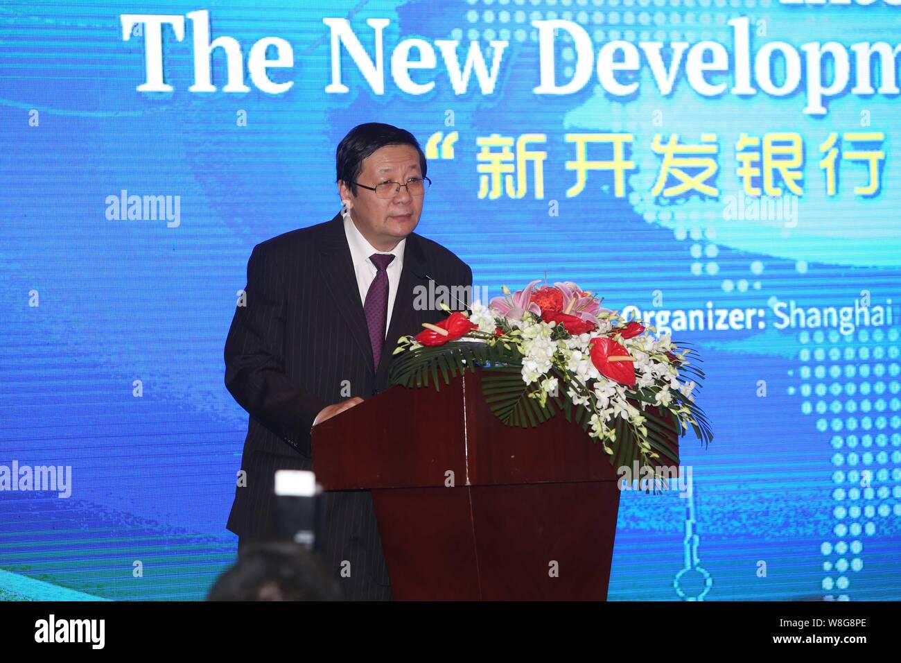 Chinese Finance Minister Lou Jiwei delivers a speech at the ...