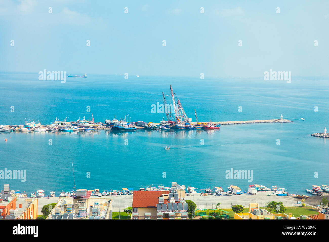 Industrial port or harbor with container or cargo ships and cranes in ...