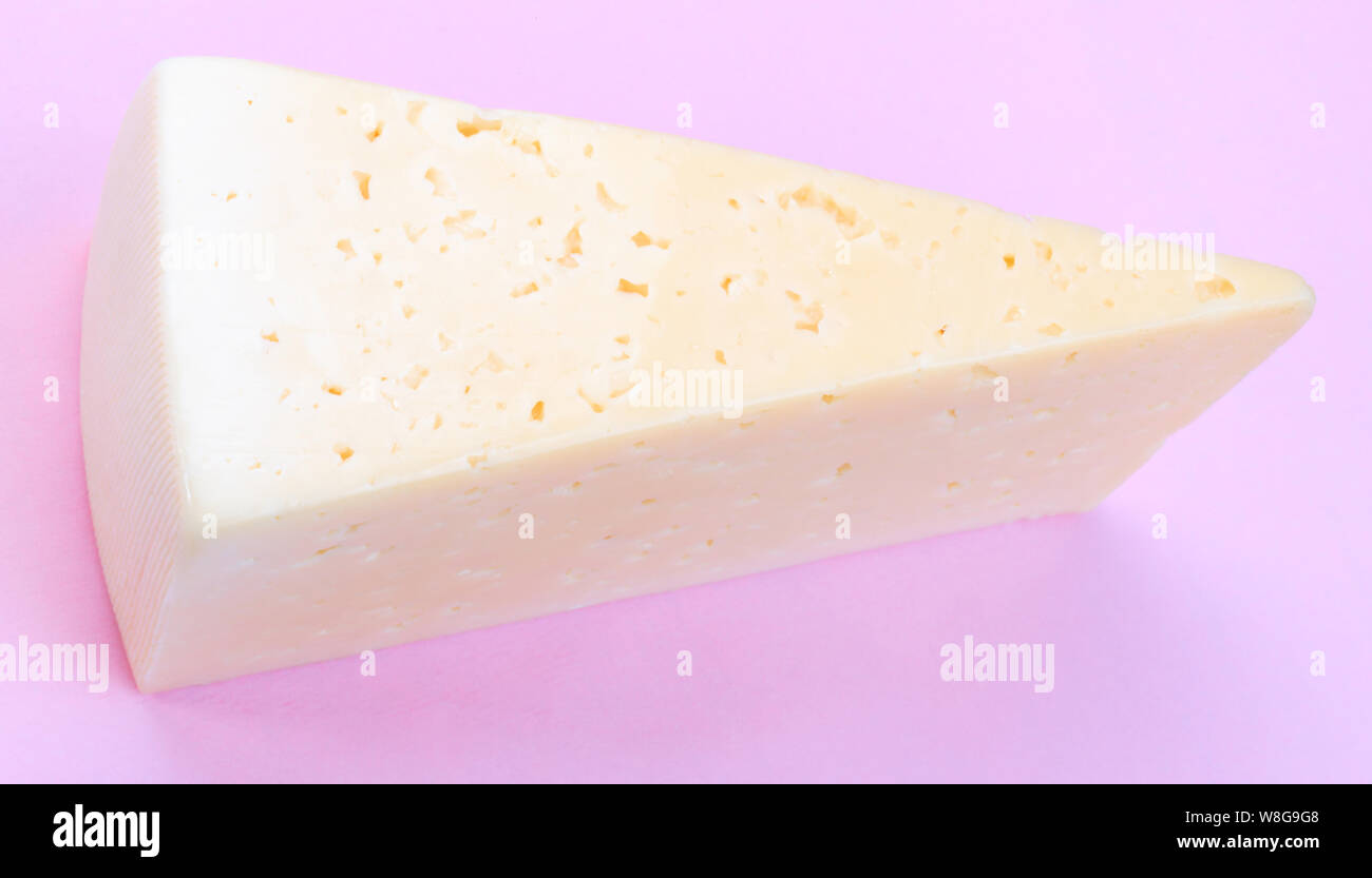 Cheese on Pink Background Stock Photo - Alamy
