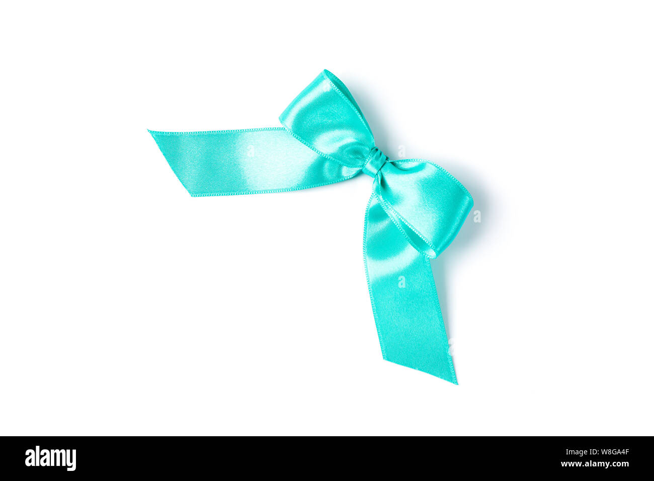 Turquoise bow isolated on white background. Gift concept Stock Photo ...