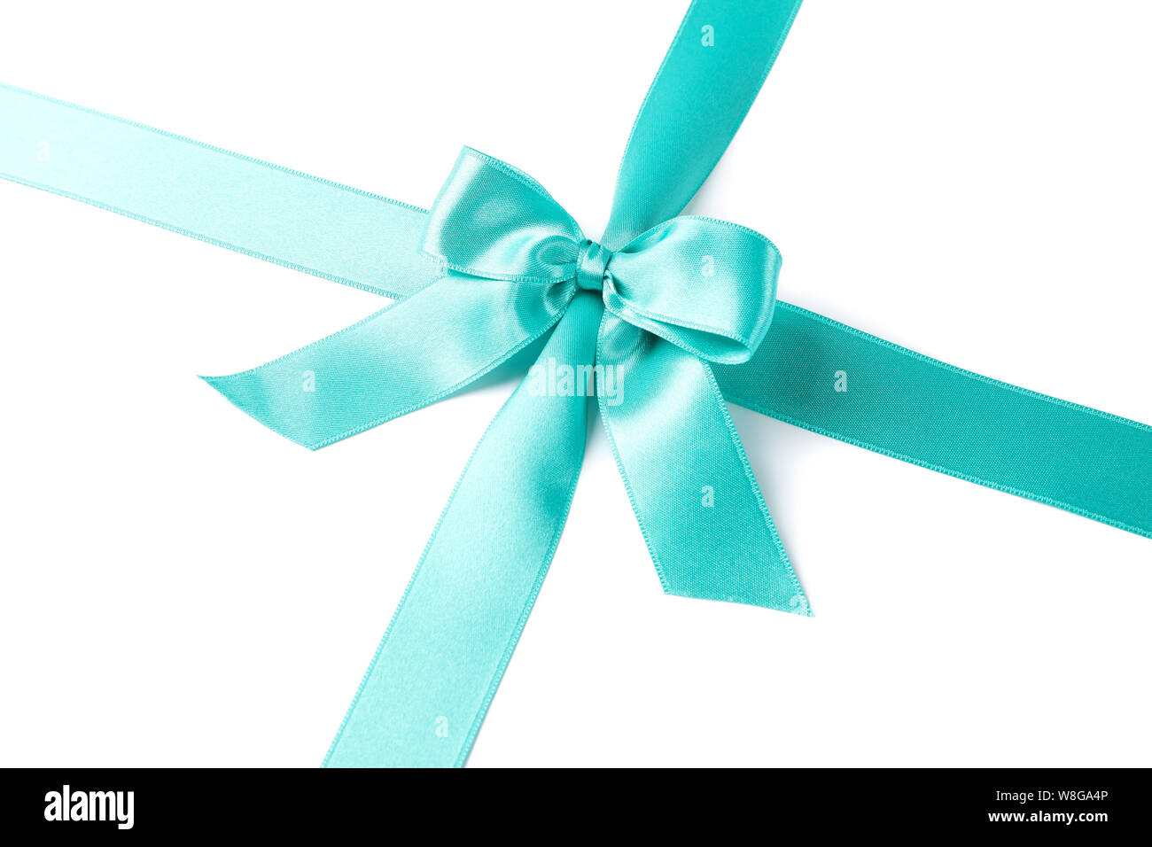 Turquoise ribbon with bow isolated on white background. Gift concept ...