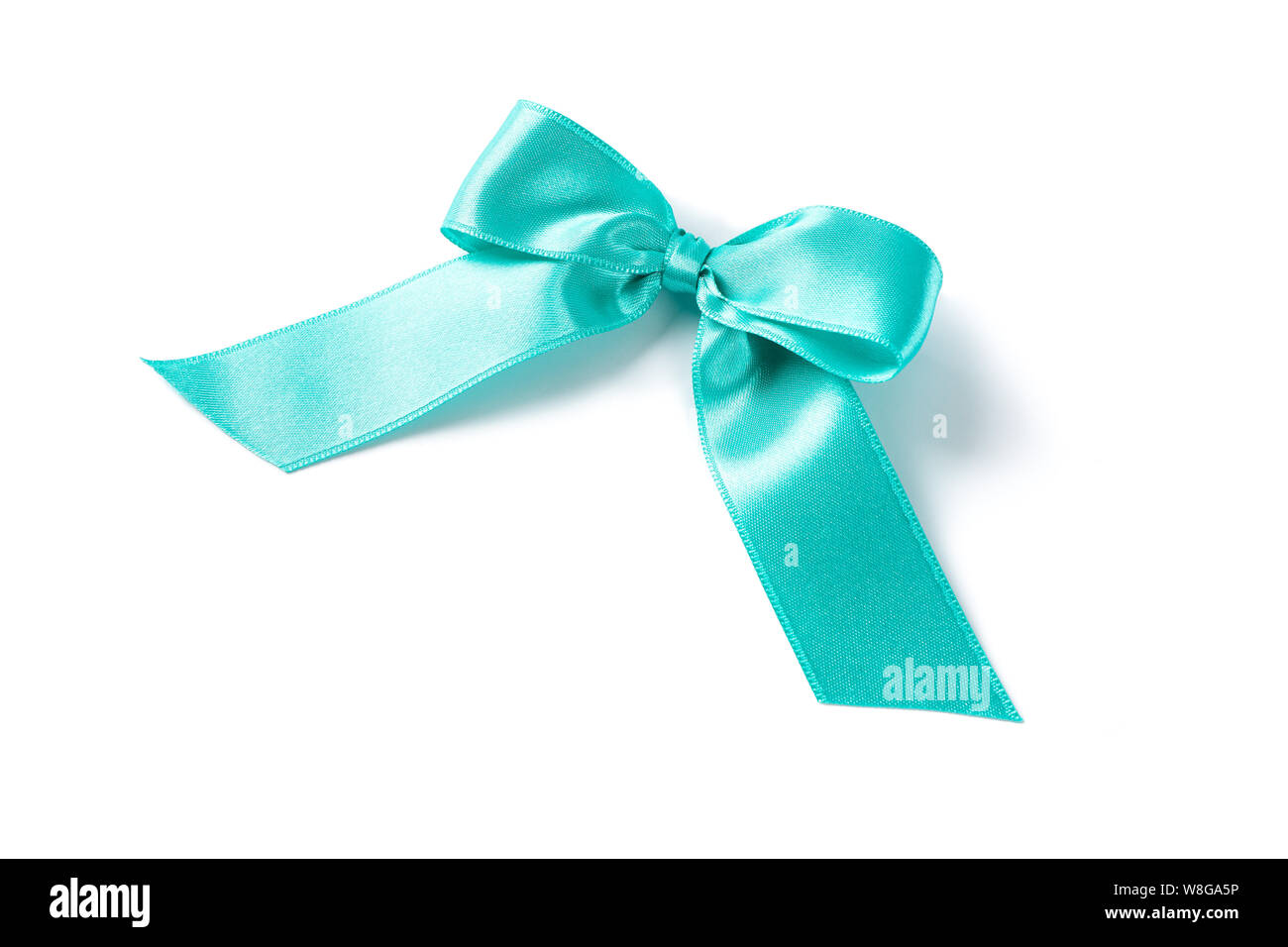 Turquoise bow isolated on white background. Gift concept Stock Photo ...
