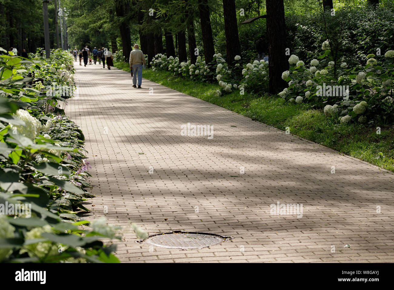 Moscow, Russia-August 6, 2019: depiction of people walking along a path ...