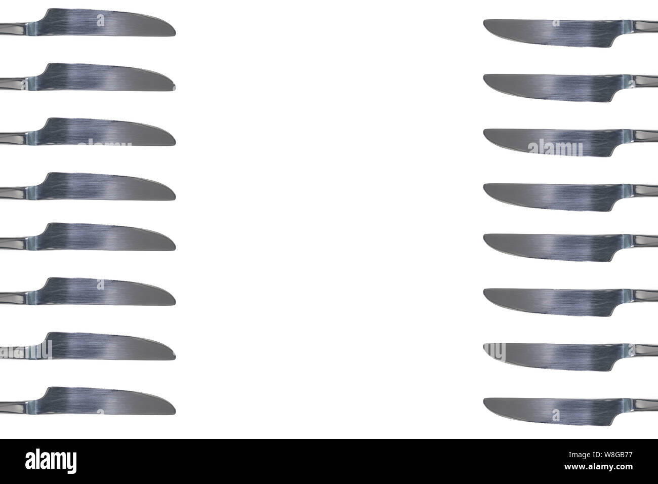 A lot of silver shiny knives. Isolated white background. Concept copy ...