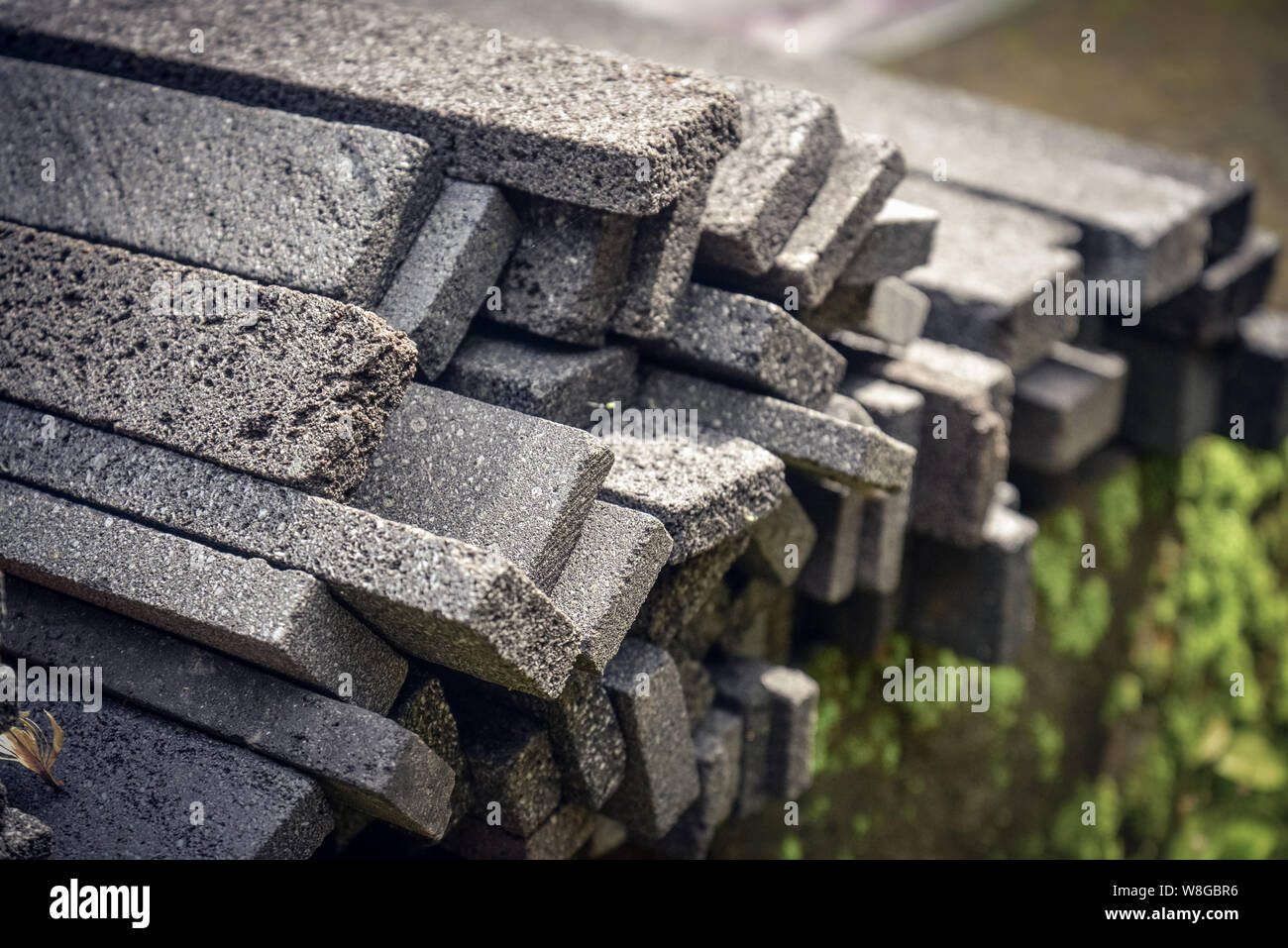 Stack of natural stone bricks in Bali, Indonesia Stock Photo - Alamy