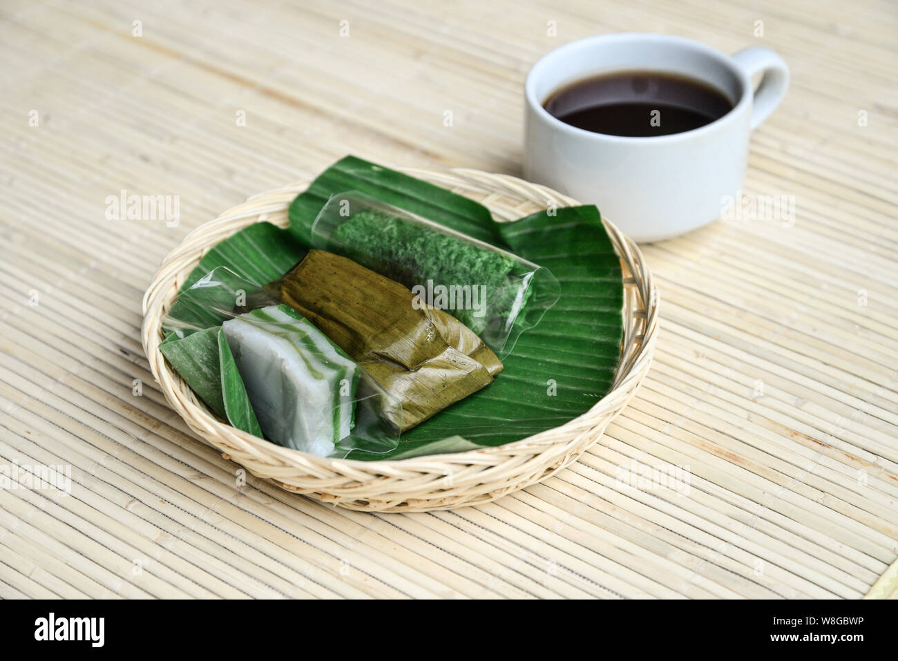 Authentic Bali sweets from rice flour with cup of tea Stock Photo - Alamy
