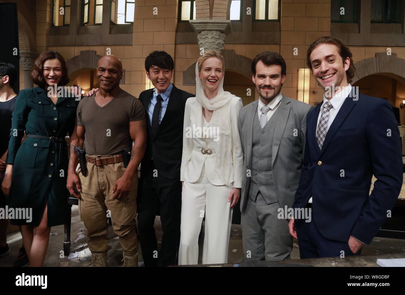 (From left) Chinese model and hostess Li Ai, retired American boxer ...