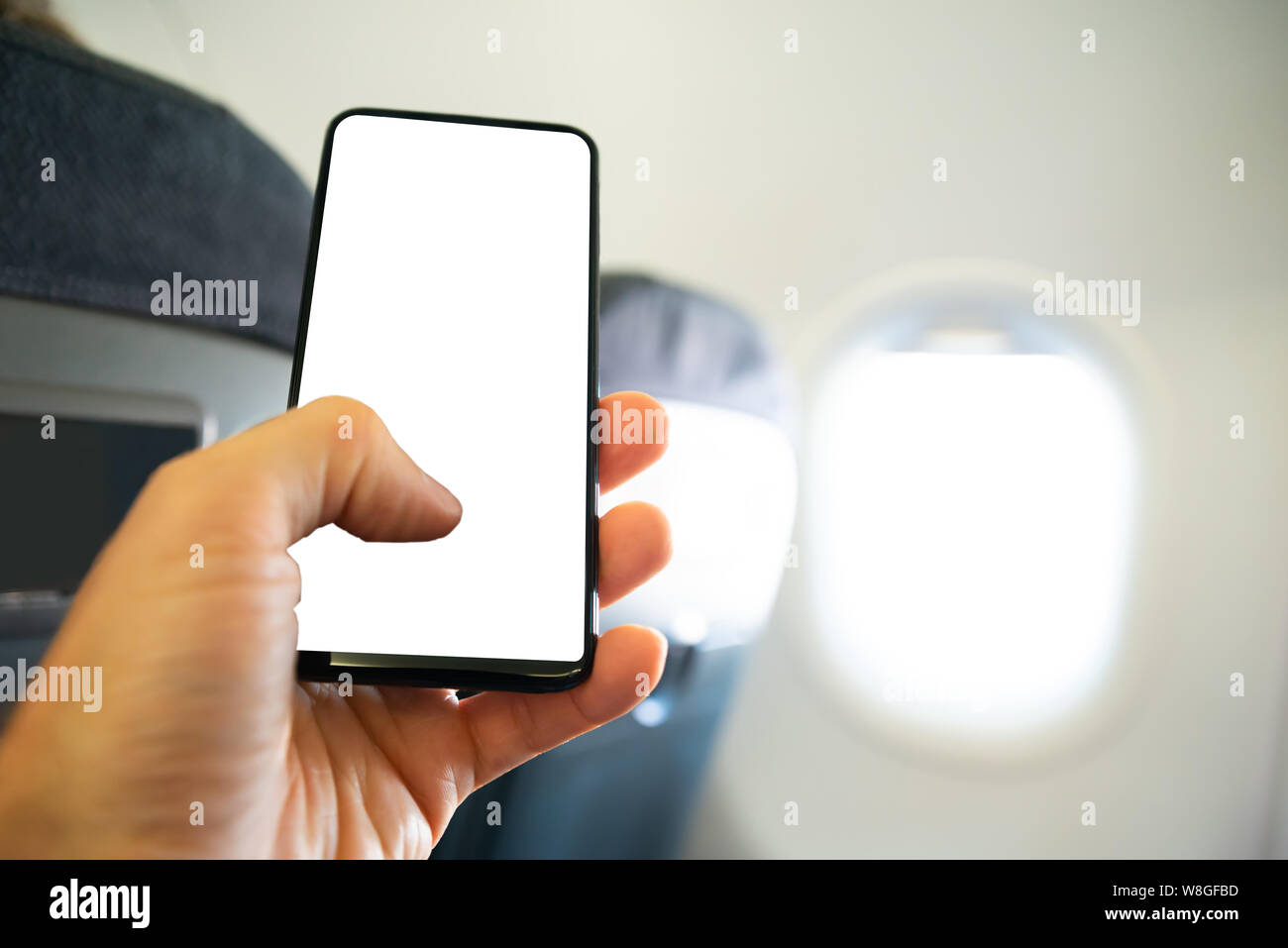Airplane passenger mobile hi-res stock photography and images - Alamy