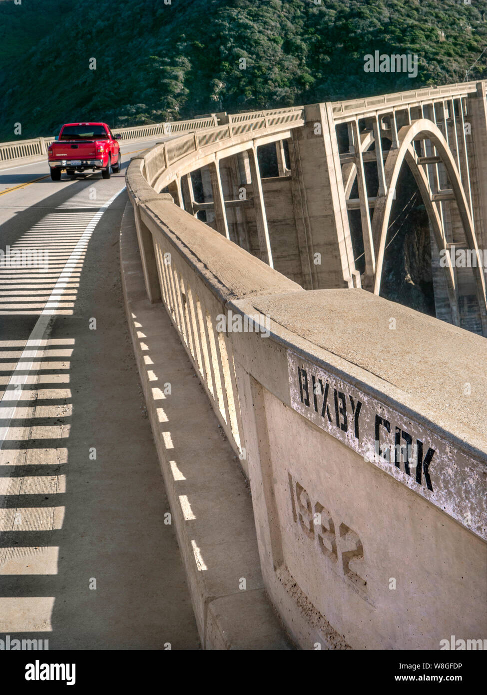 CA-1 HIGHWAY ONE Bixby Bridge with red American pick-up truck crossing ...