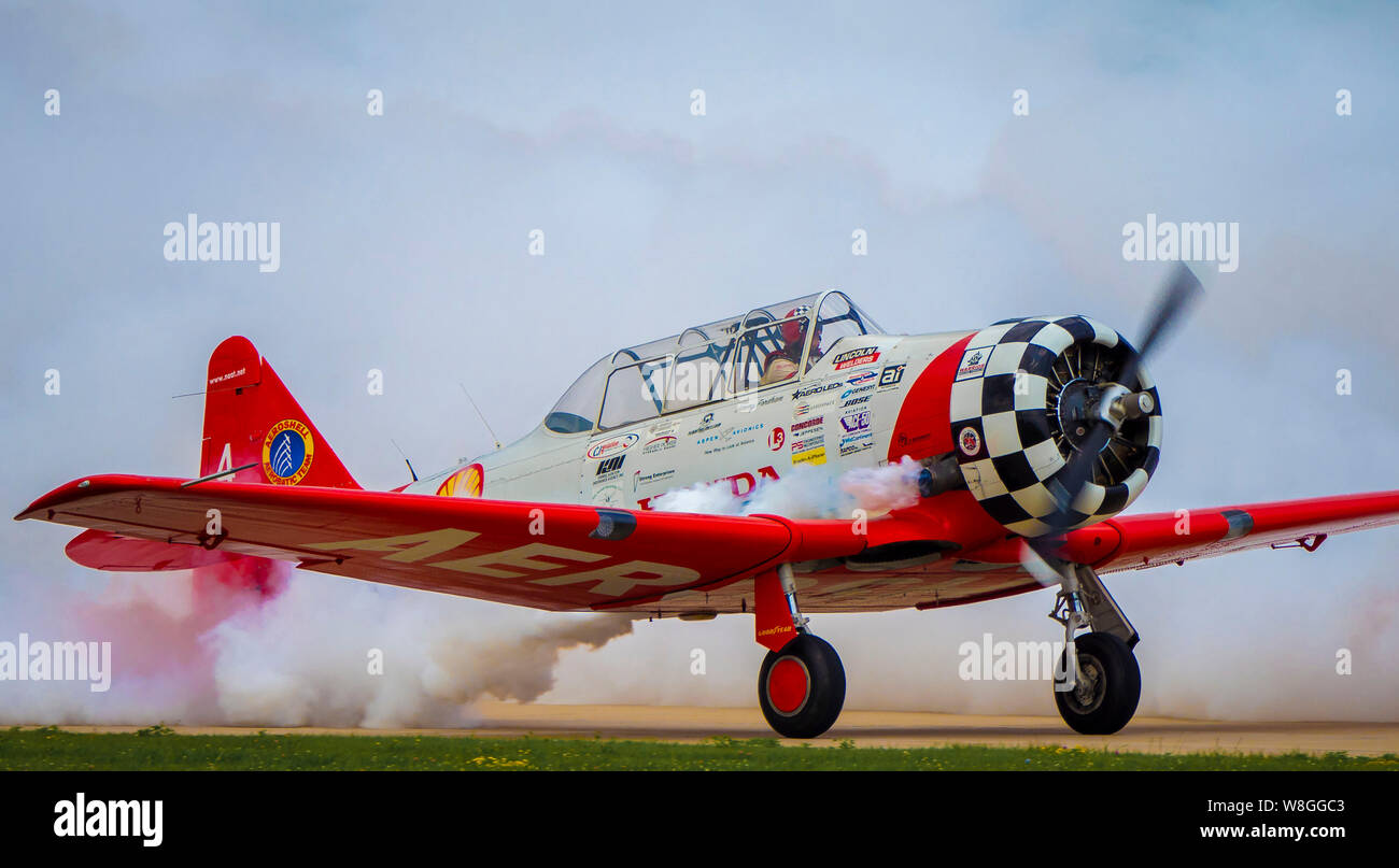 The Aeroshell Aerobatic Team (T-6 Texans) prepare for take off at the ...