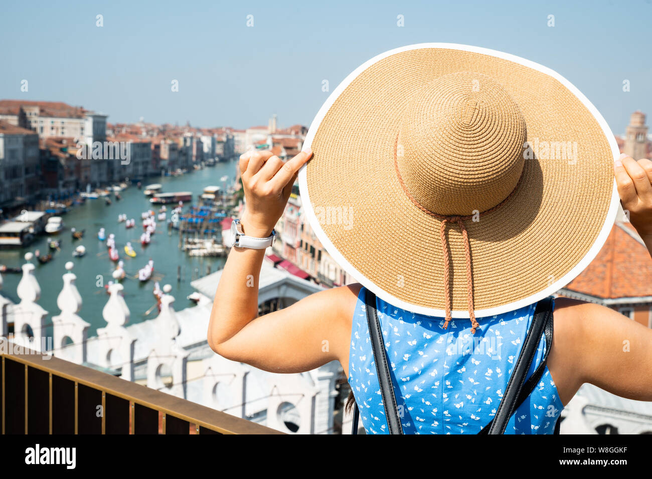 Woman looking over bridge hi-res stock photography and images - Alamy