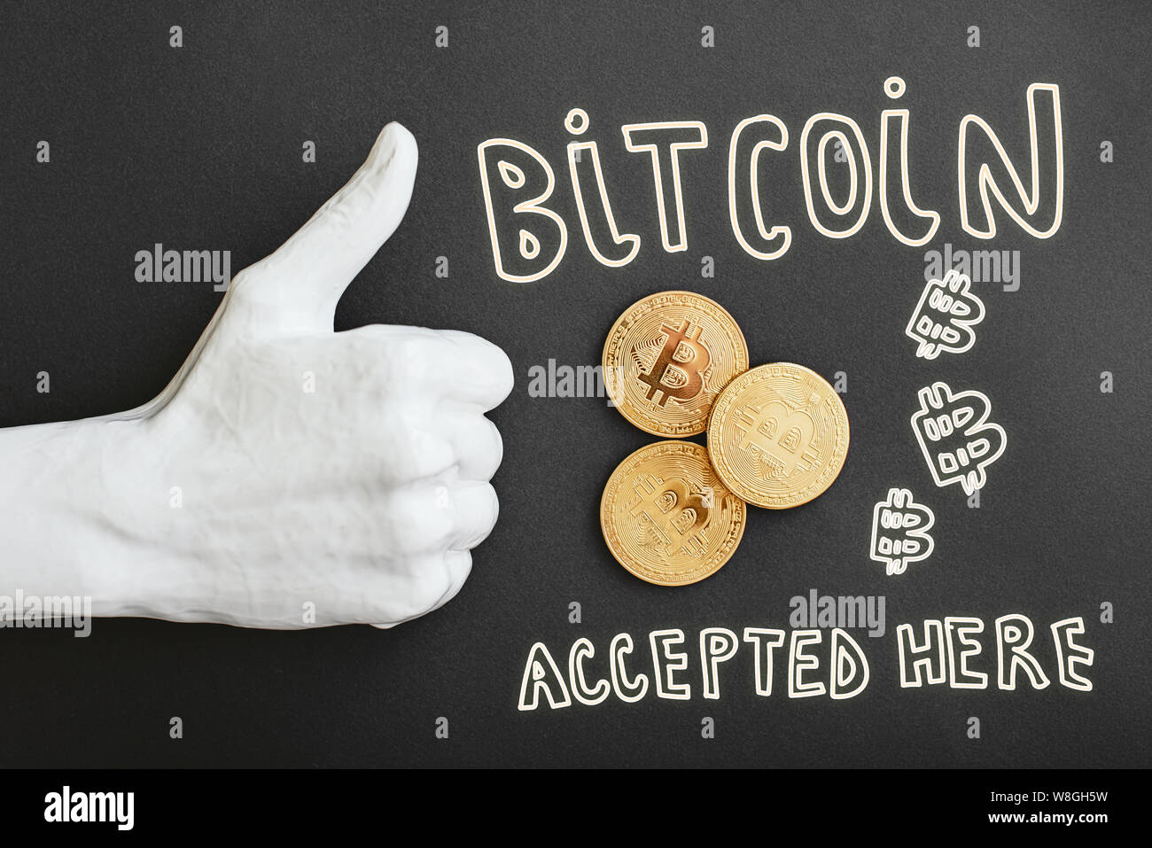 Pile of bitcoins isolated on black background. Hand drawn doodle ...