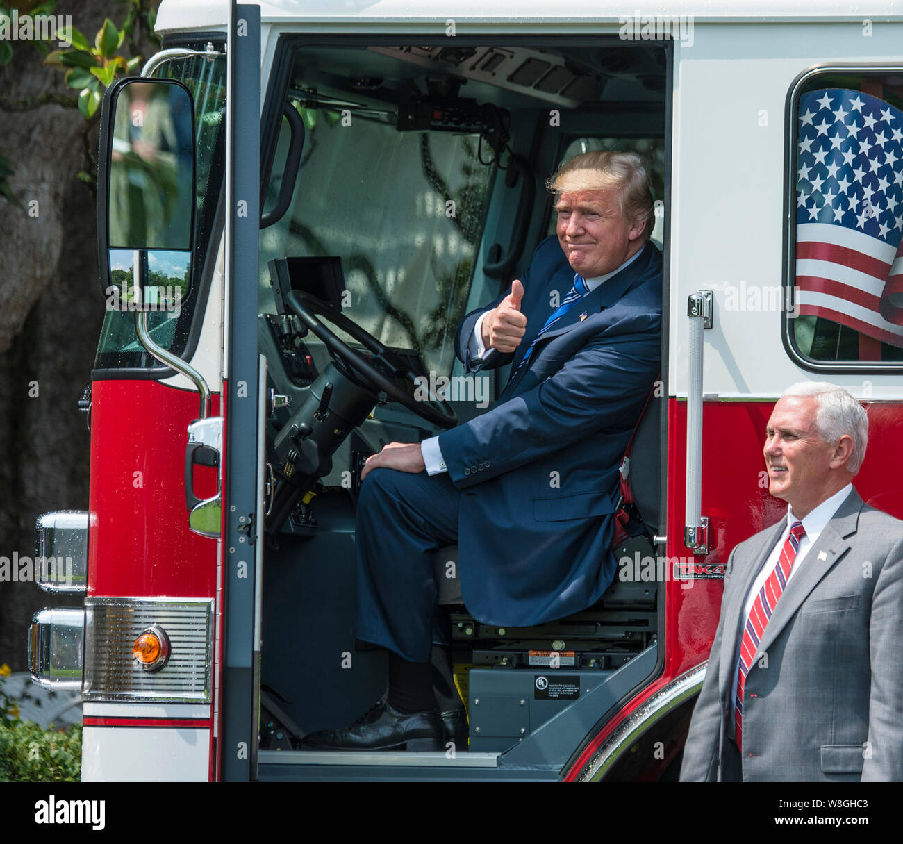 2017 - President Donald Trump sitting in the cab of a fire truck which ...