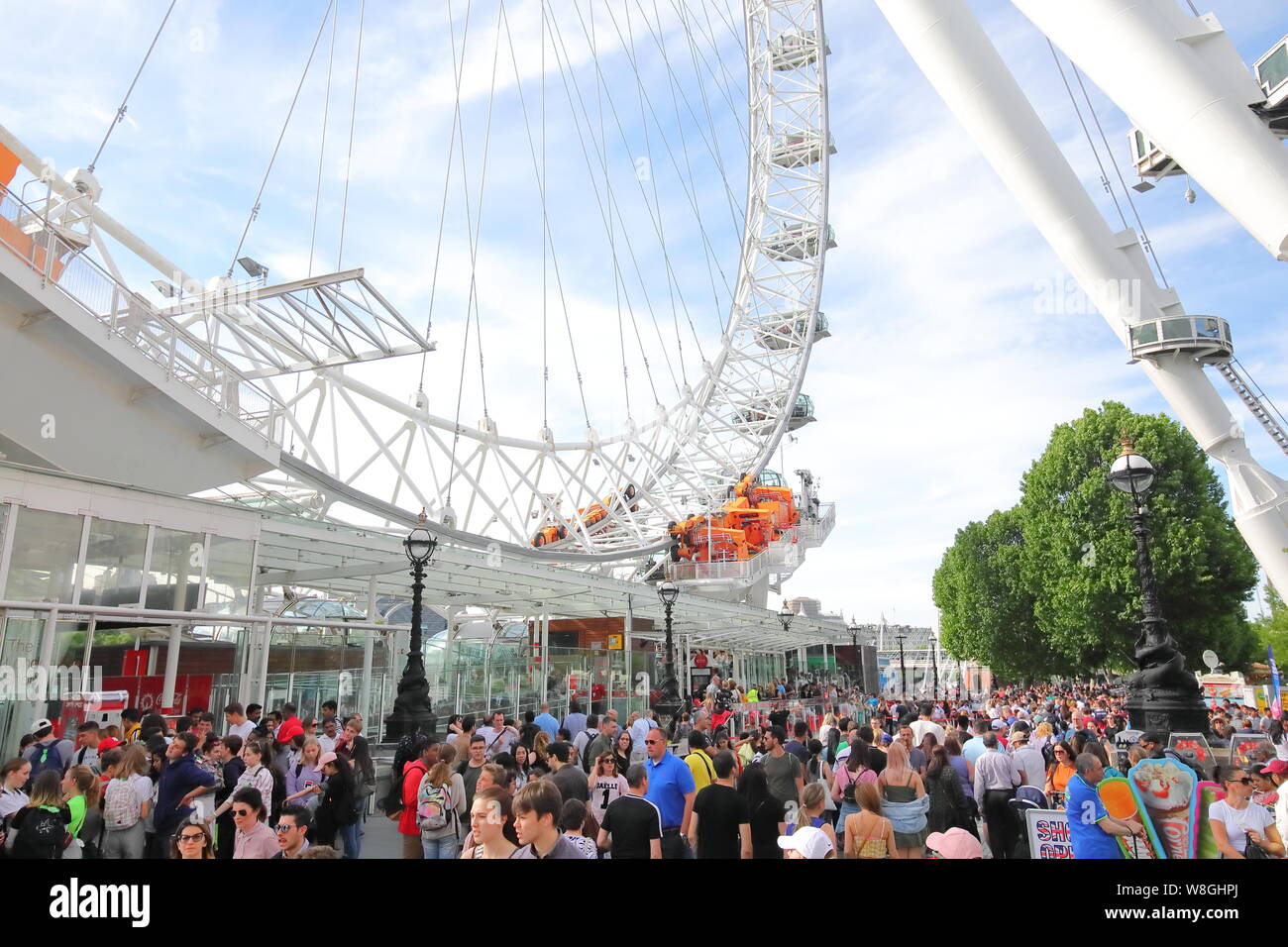 People queue at London eye observation wheel London UK Stock Photo - Alamy