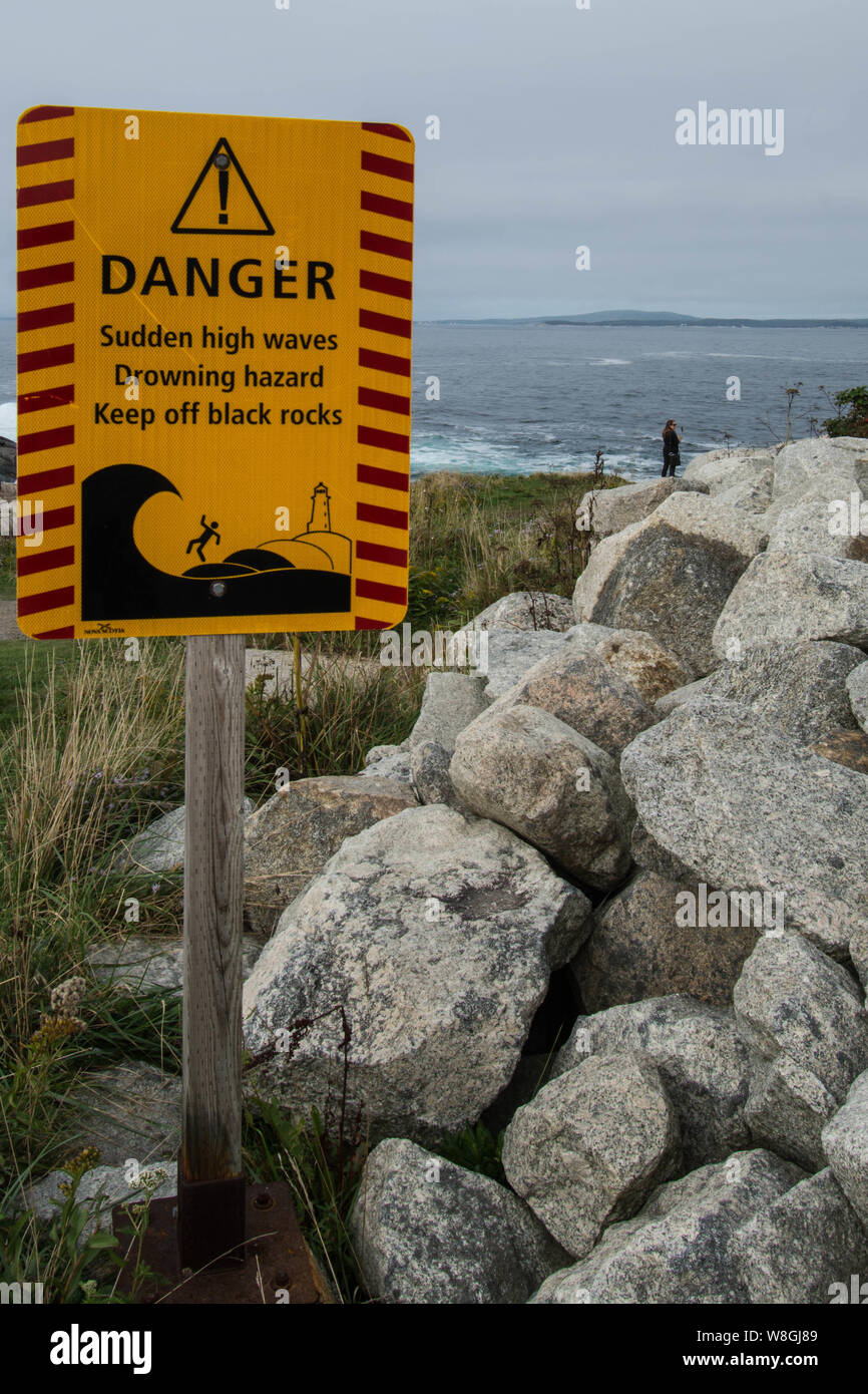 Peggys Cove Danger sign rock rocks boulders bolder water sea rocky ...