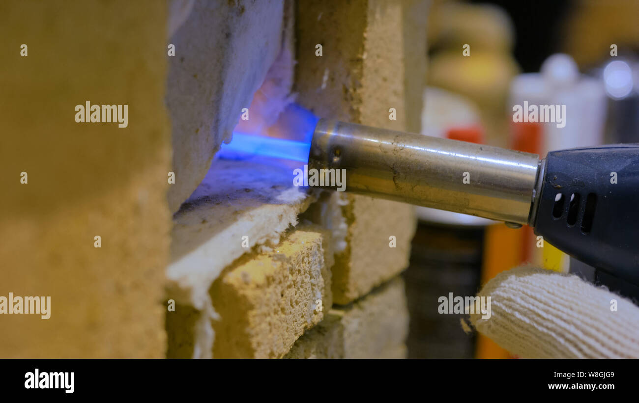 Gas jet flame burner gun Stock Photo - Alamy