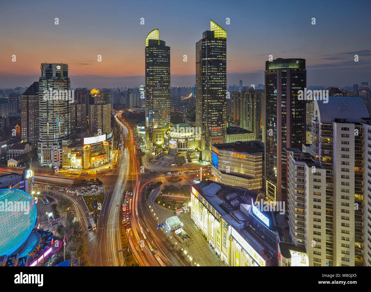 Night view of busy streets, the skyscrapers of Grand Gateway, tallest ...