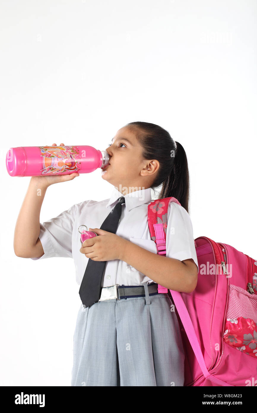Girl drinking water from water bottle Stock Photo - Alamy
