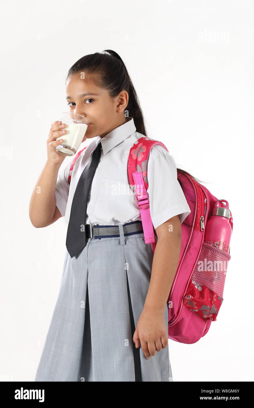 Child in school uniform drinking milk hi-res stock photography and ...