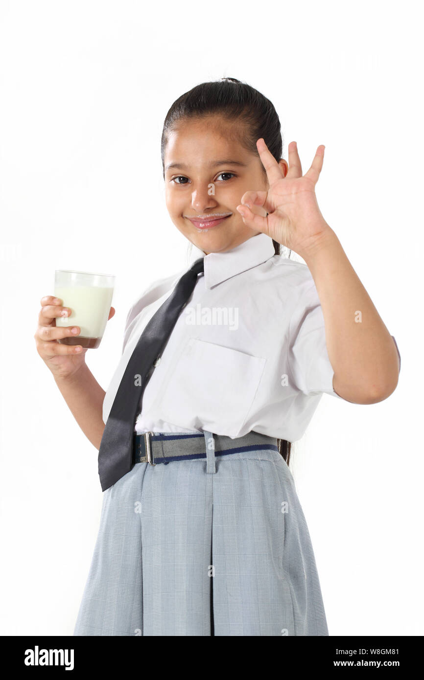 Indian girl drinking milk hi-res stock photography and images - Alamy