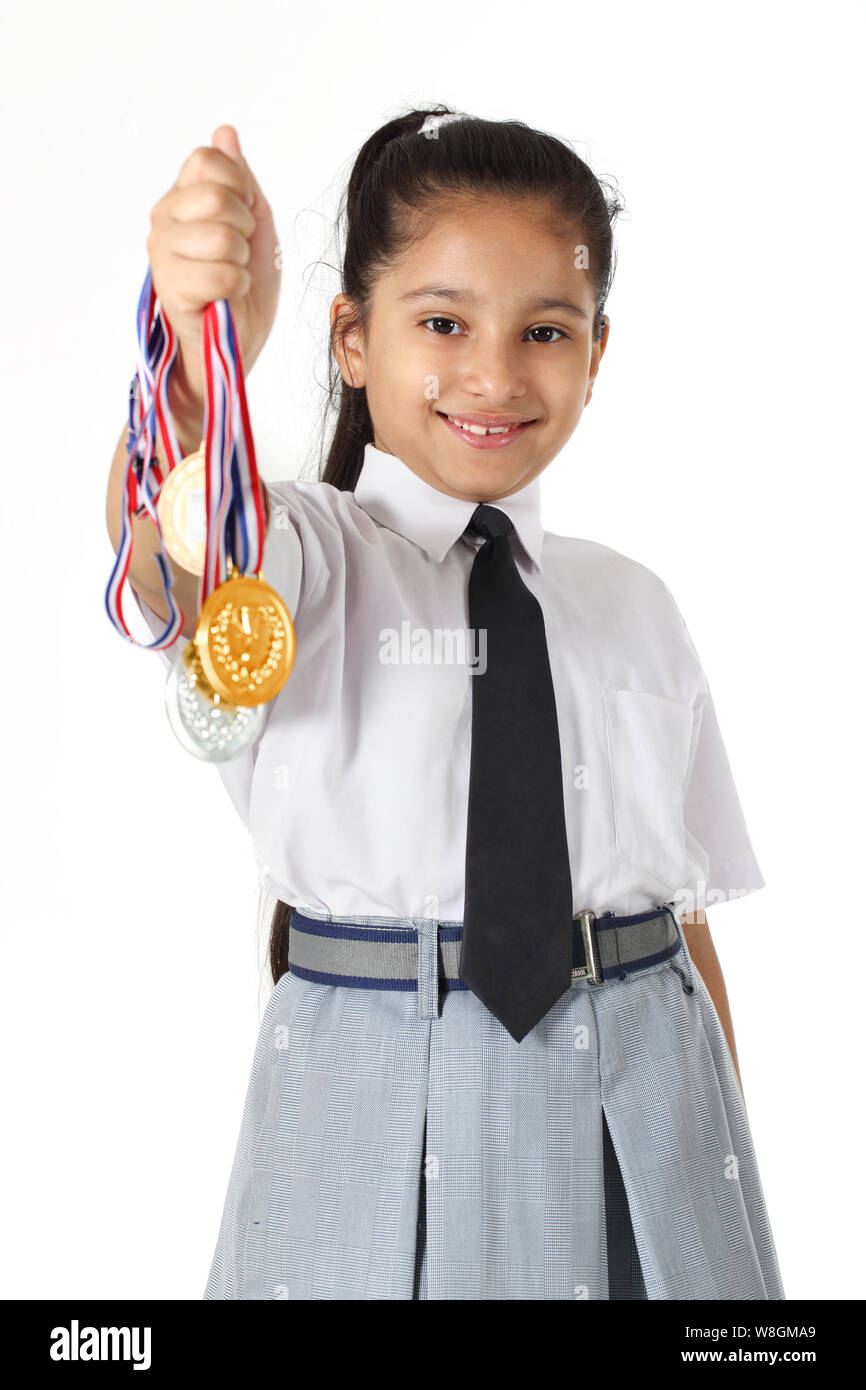 Girl holding medal hi-res stock photography and images - Alamy