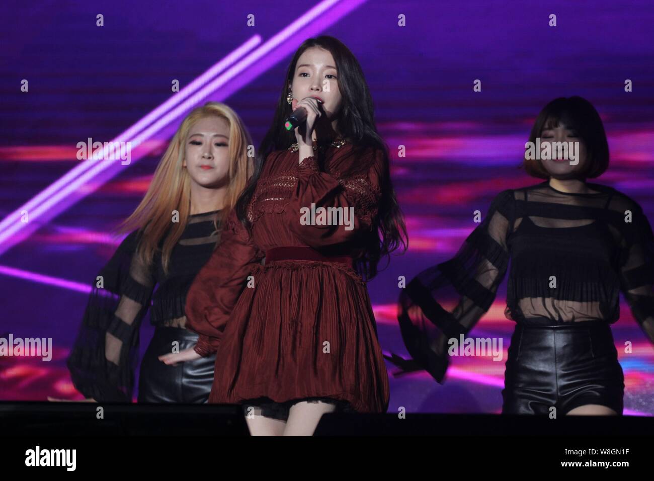 South Korean singer-songwriter and actress Lee Ji-eun, front, better ...