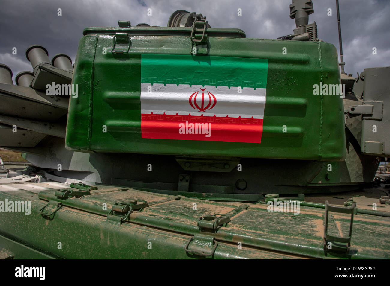 The flag of the Islamic Republic of Iran on a tower of a tank Stock ...