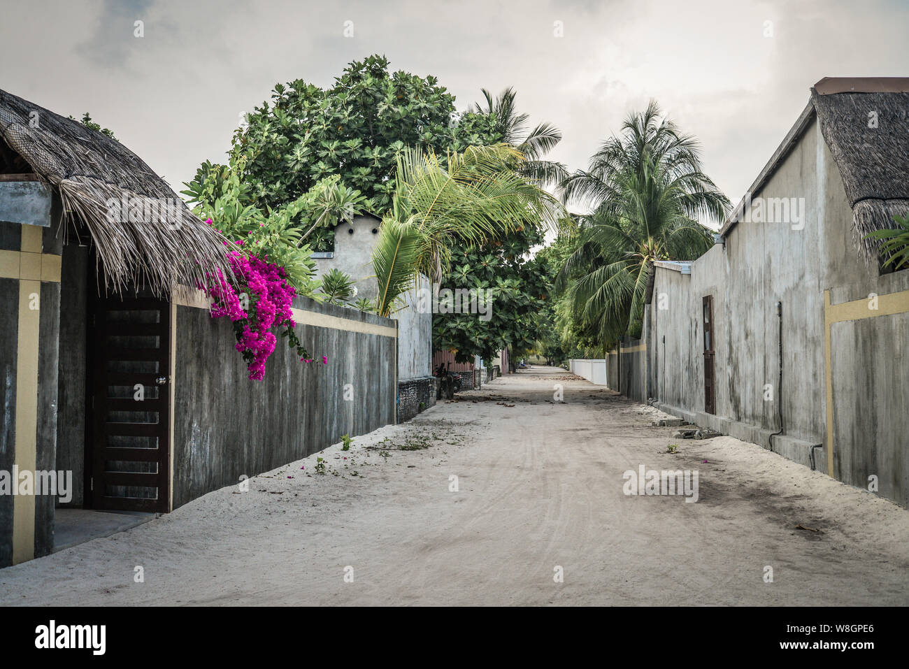 Empty street in traditional Maldivian village on Fehendhoo island, Baa ...