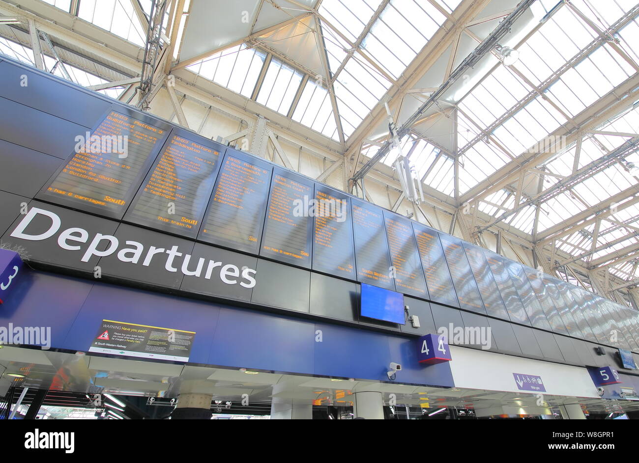 Departure timetable at Waterloo train station railway London UK Stock ...