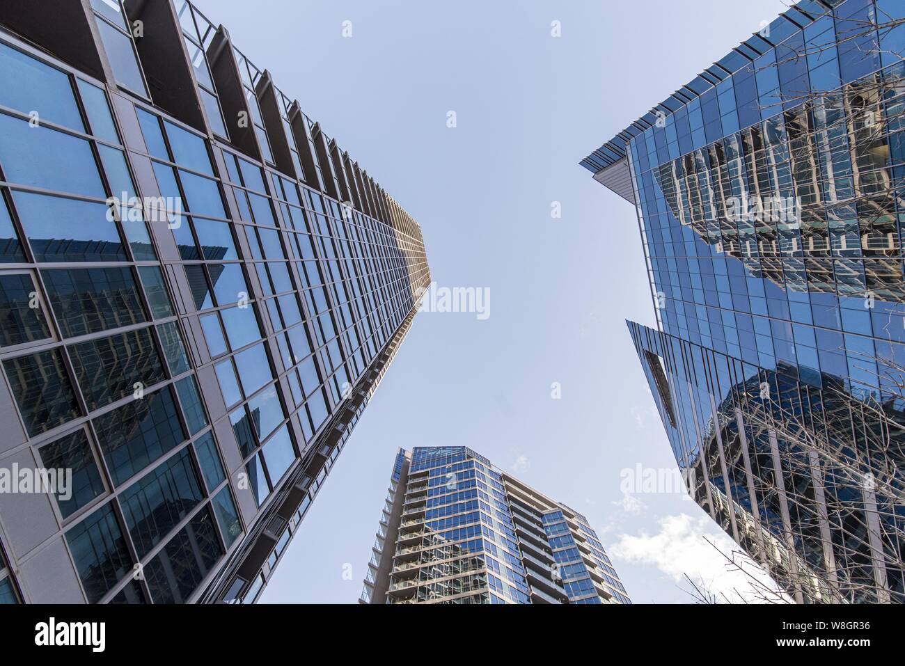 Low angle shot of blue high rise buildings Stock Photo - Alamy