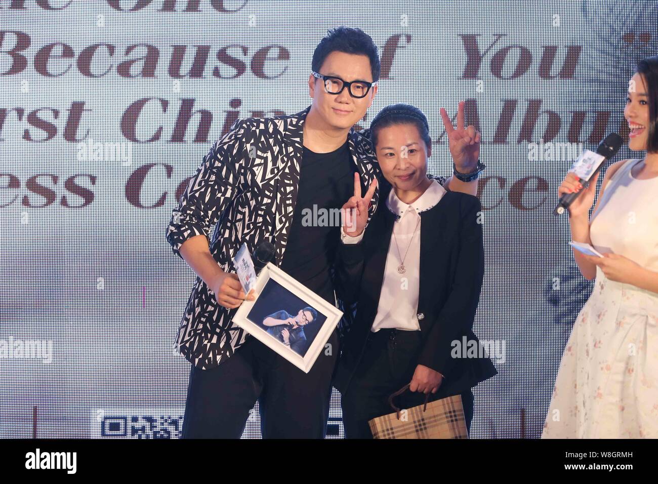 South Korean singer Jeong Soon-won, left, better known by his stage ...