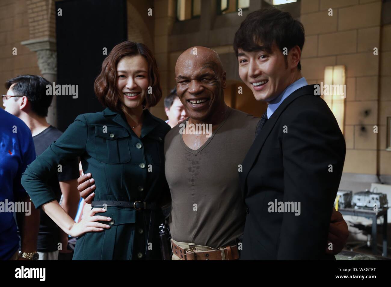 (From left) Chinese model and hostess Li Ai, retired American boxer ...