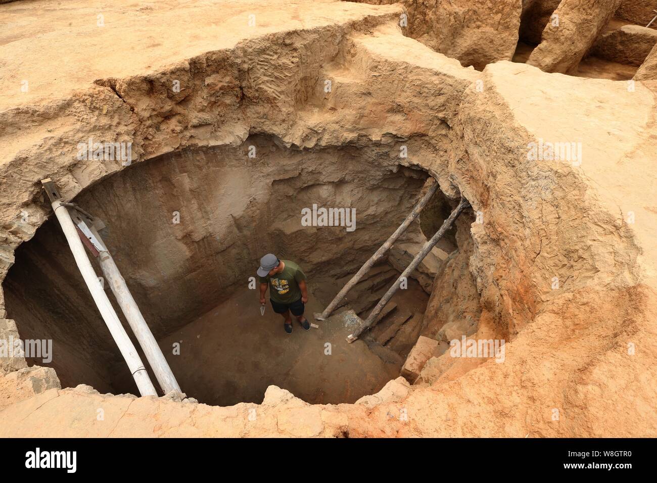 A Chinese archaeologist excavates the ancient kilns of the Eastern Han ...