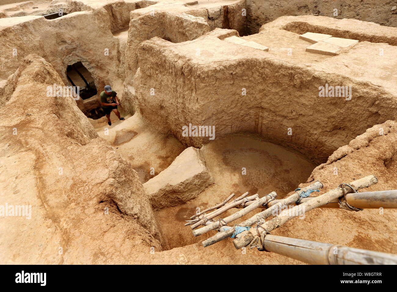 A Chinese archaeologist excavates the ancient kilns of the Eastern Han ...
