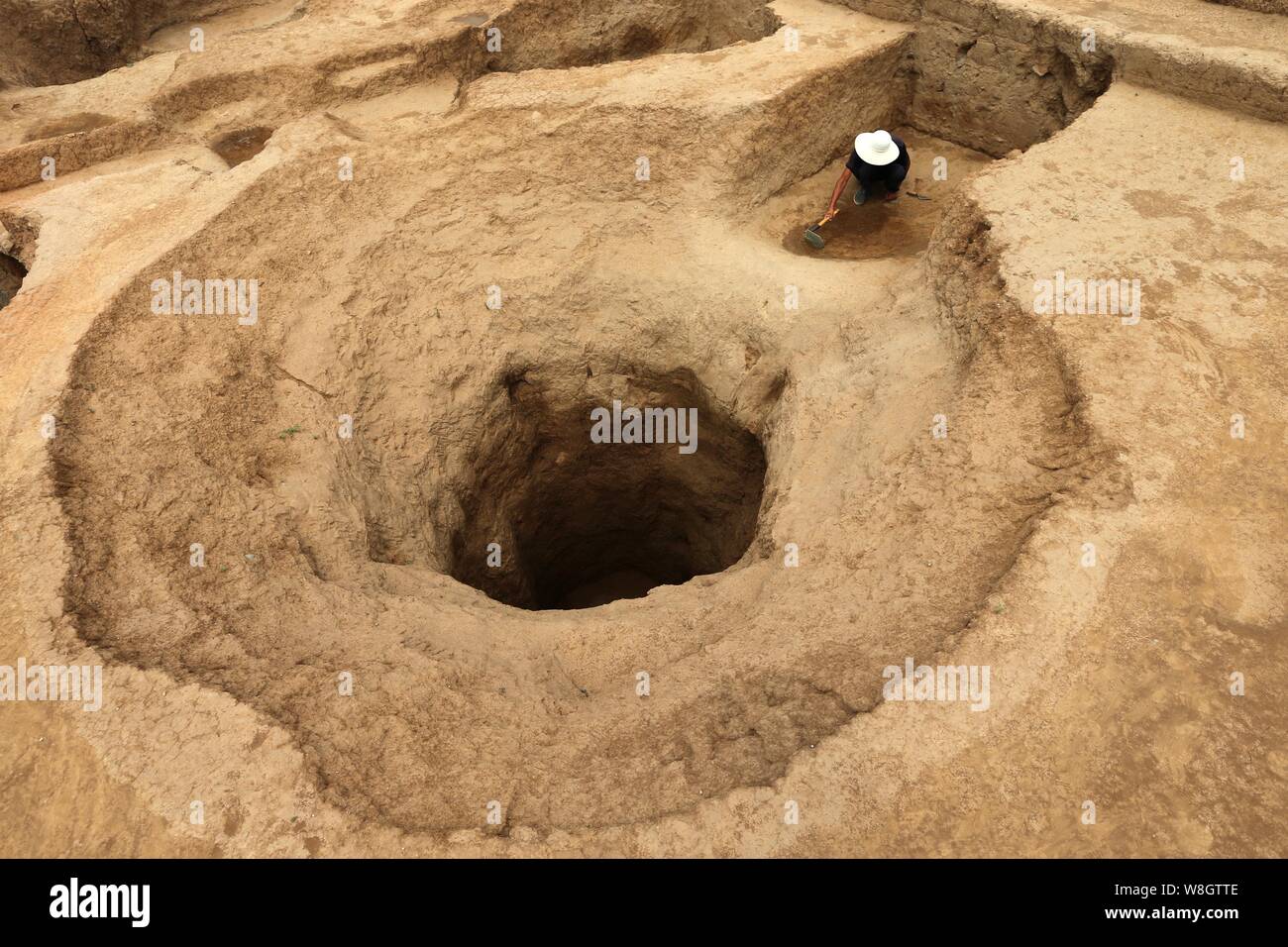 A Chinese archaeologist excavates the ancient kilns of the Eastern Han ...