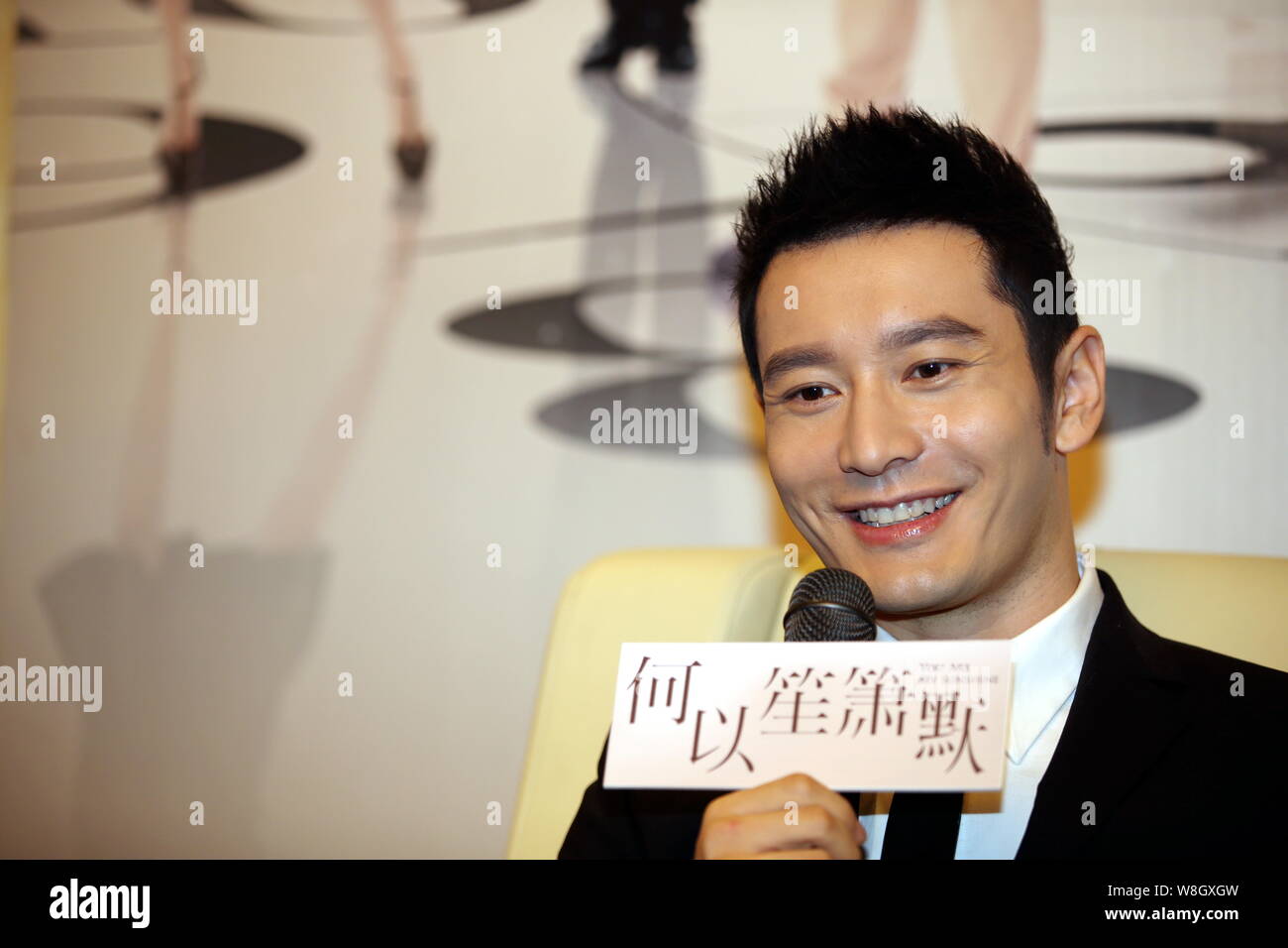 Chinese actor Huang Xiaoming speaks at a promotional event for his new ...