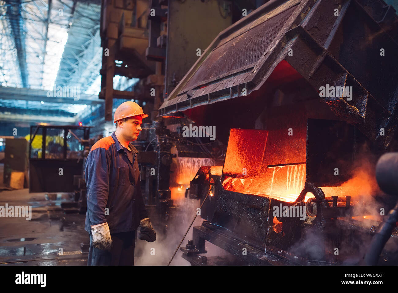 Workers in the steel mill on the metallurgical plant Stock Photo - Alamy